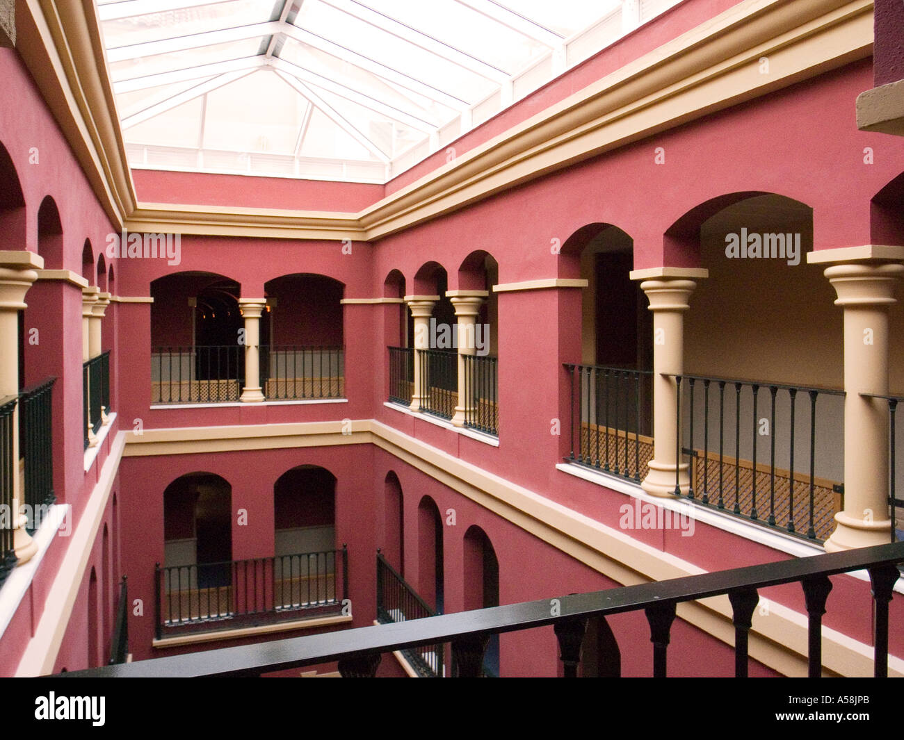 An atrium in a modern Spanish hotel inspired by Andalusian Moorish ...