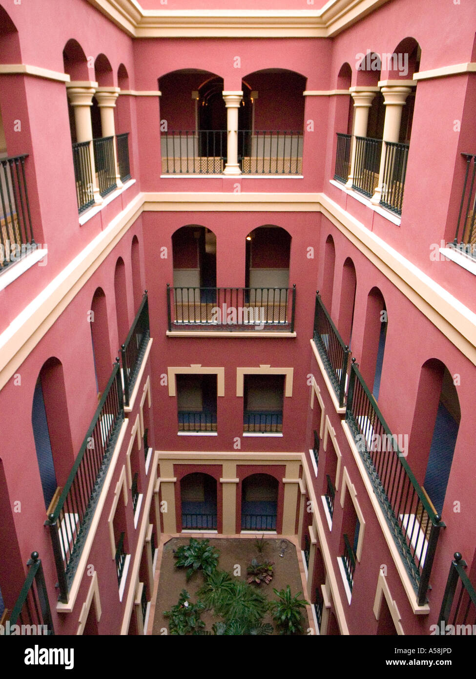 An atrium in a modern Spanish hotel inspired by Andalusian Moorish ...