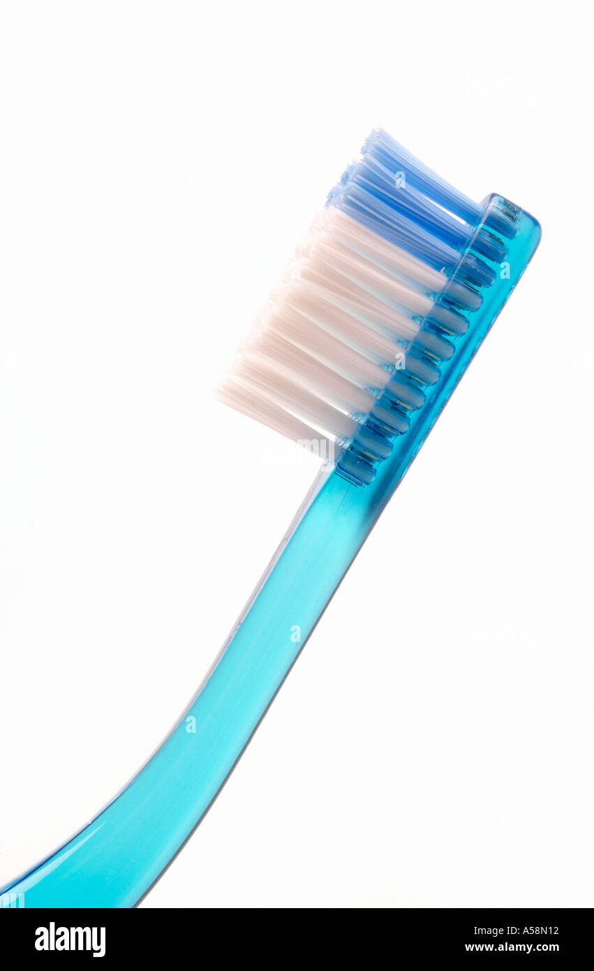 Blue transparent toothbrush on white background Stock Photo - Alamy
