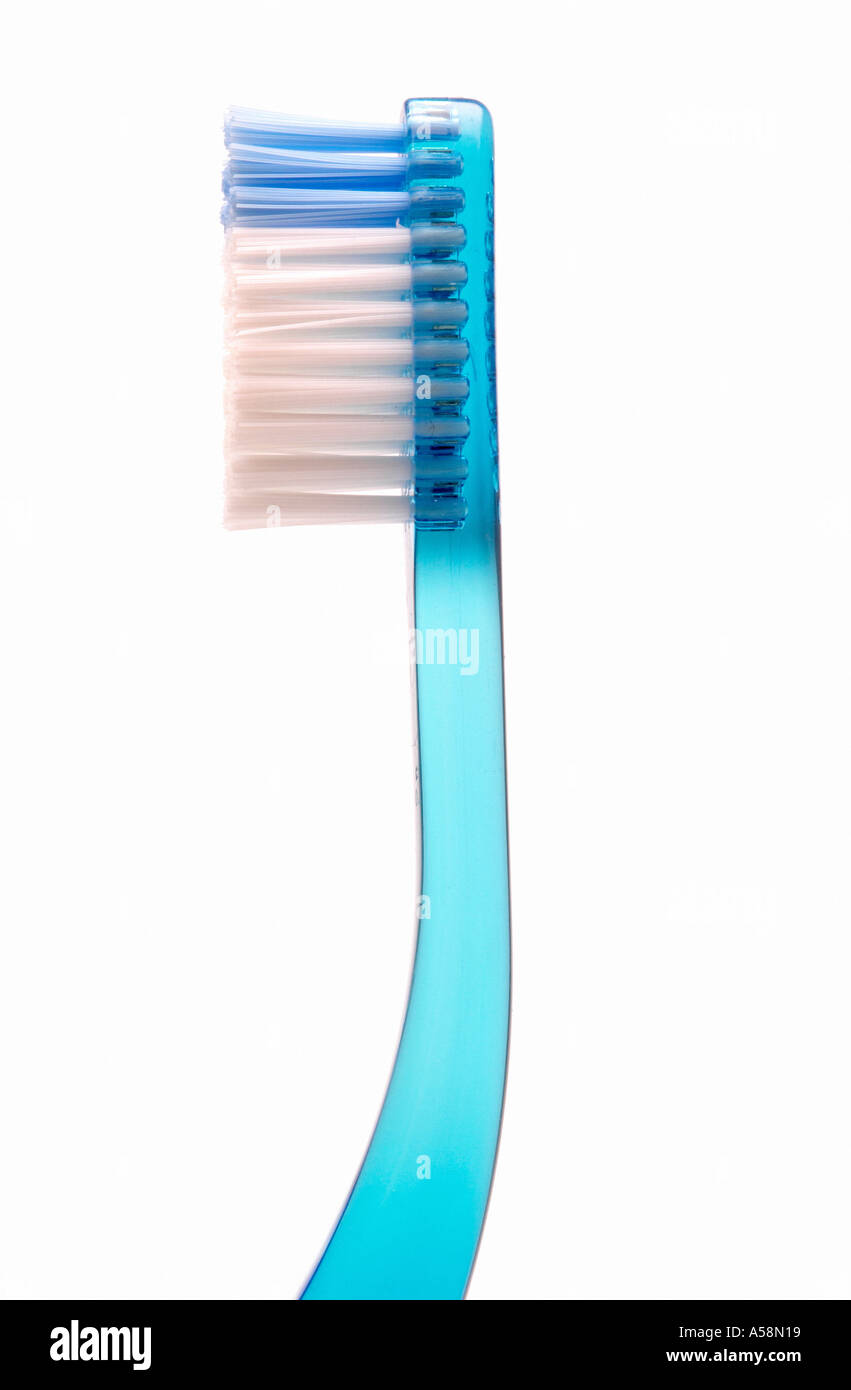Blue transparent toothbrush on white background Stock Photo - Alamy