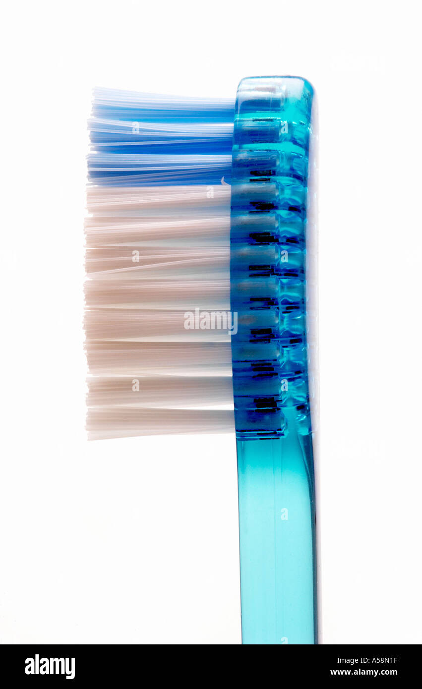 Blue transparent toothbrush on white background Stock Photo - Alamy