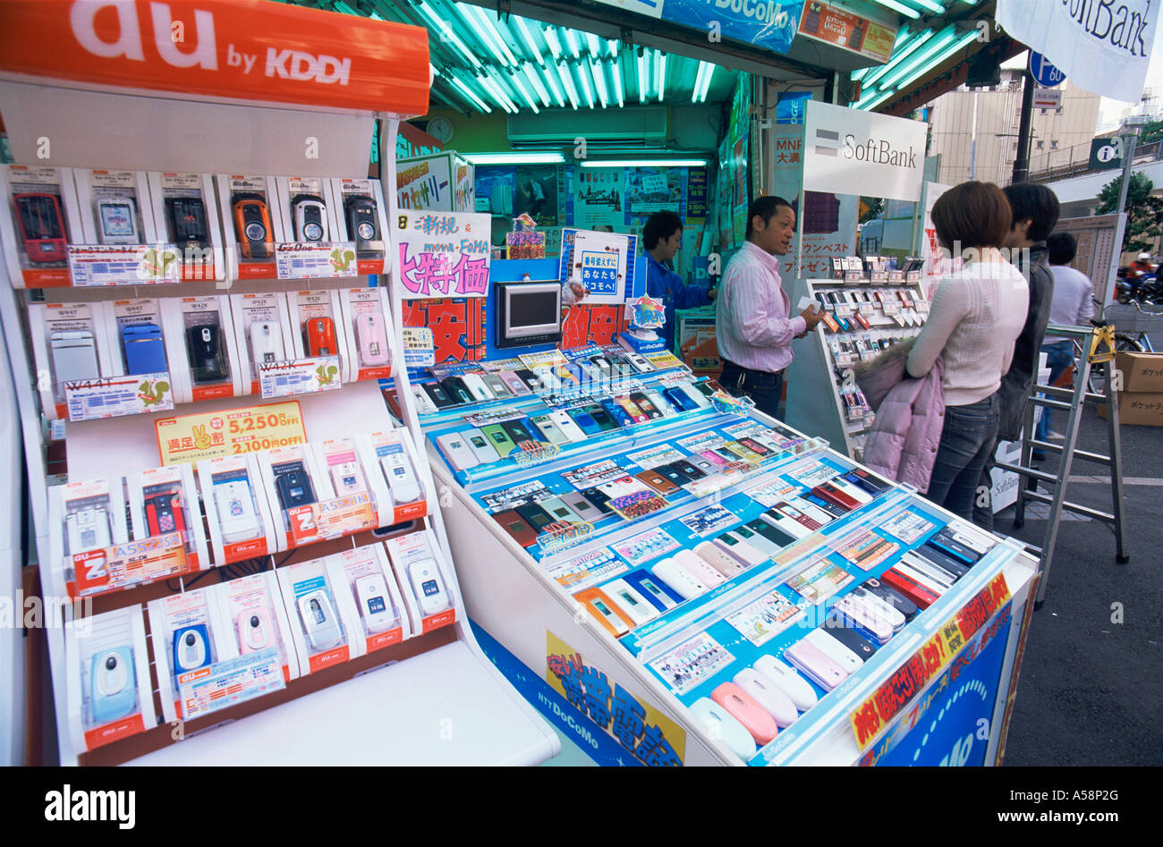 Japan, Tokyo, Akihabara Electrical District, Customers at Mobile Phone ...
