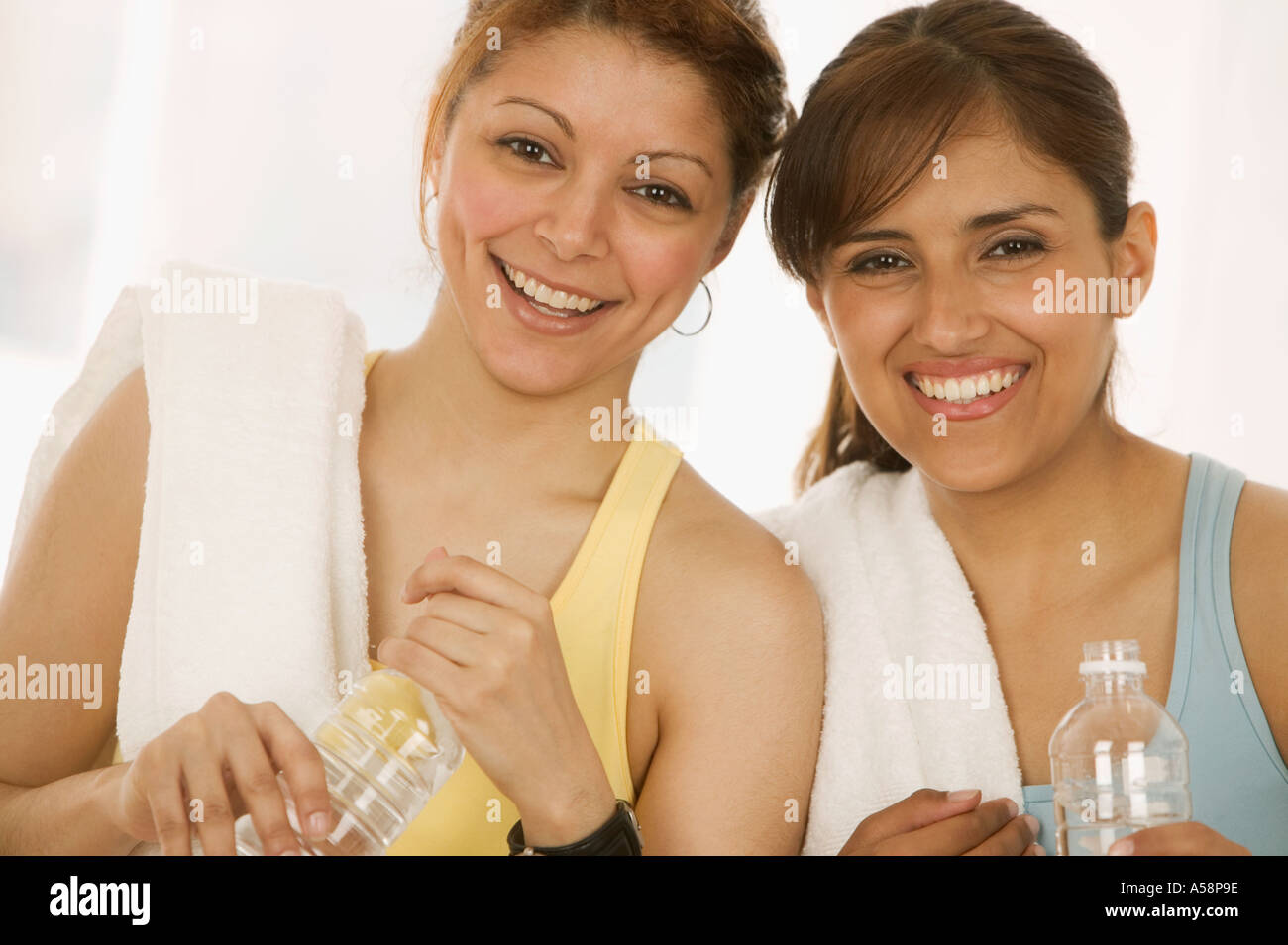 Portrait of women with water bottles Stock Photo - Alamy