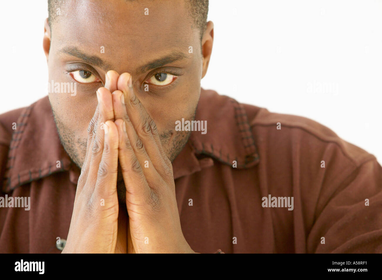 Praying hands over head hi-res stock photography and images - Alamy
