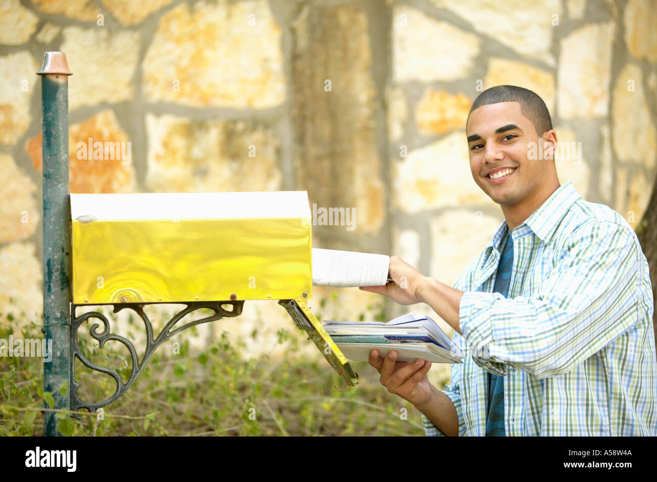 Man opening mailbox hi-res stock photography and images - Alamy