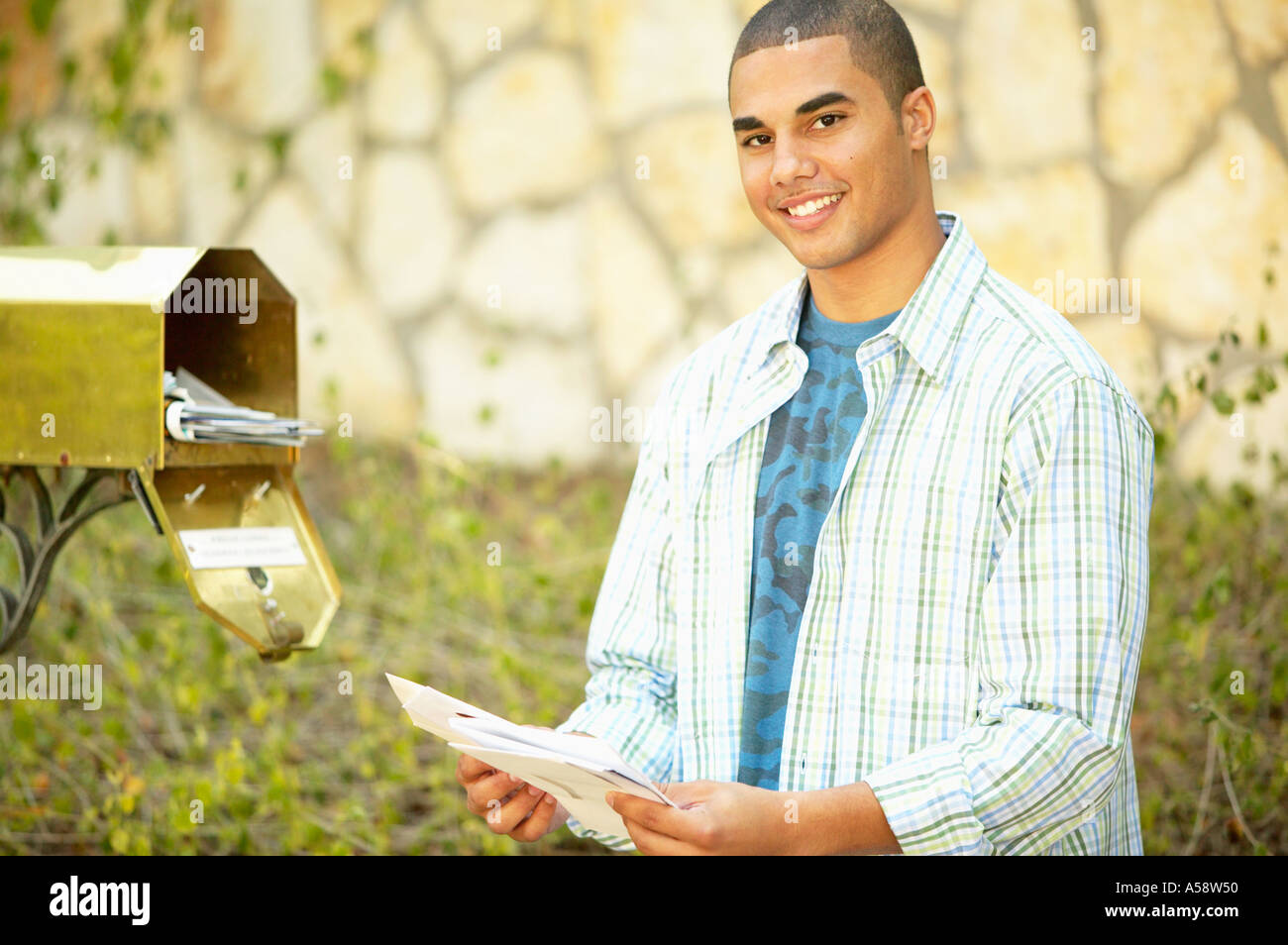 Man opening mailbox hi-res stock photography and images - Alamy