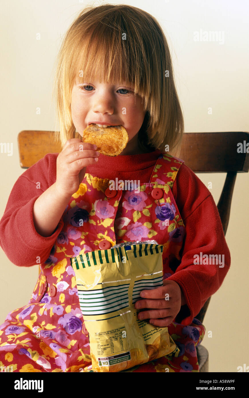 Child crisps hi-res stock photography and images - Alamy