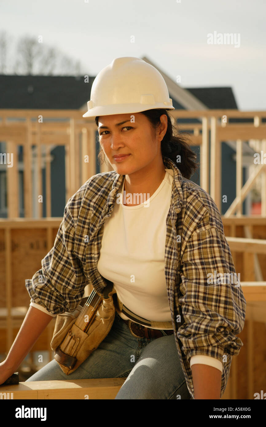 Asian female construction worker at construction site Stock Photo - Alamy