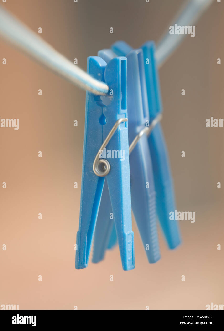 Clothes pegs on a washing line Stock Photo - Alamy