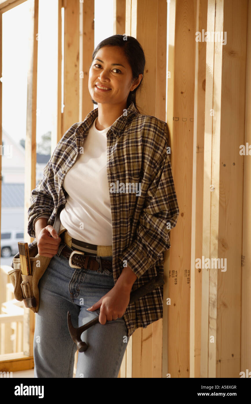 Asian female construction worker inside construction site Stock Photo ...
