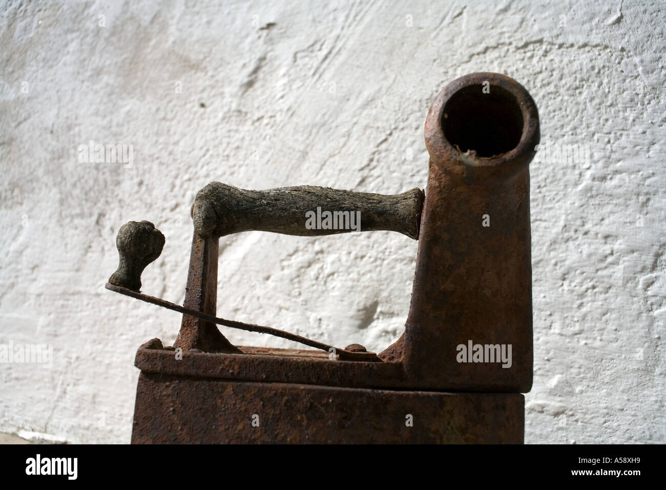 Old fashioned antique steam iron Old fashioned antique steam iron rusty ...