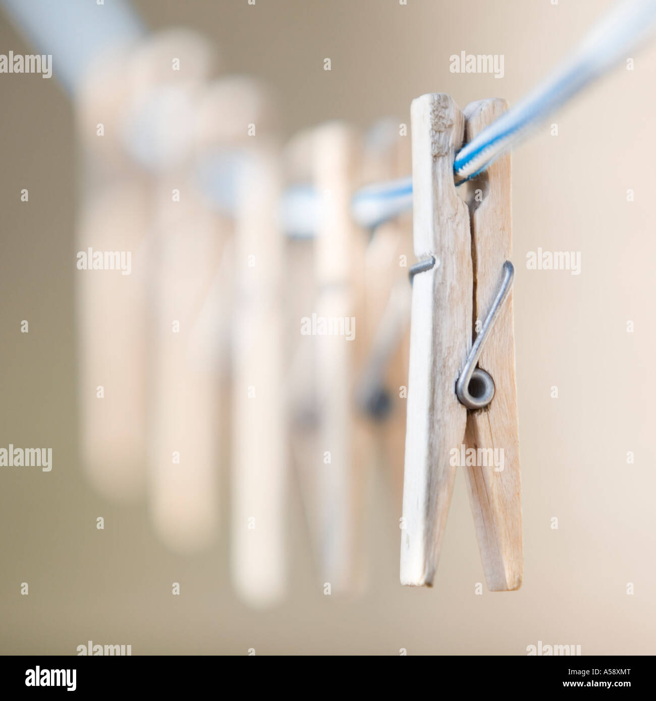 Clothes pegs on a washing line Stock Photo - Alamy