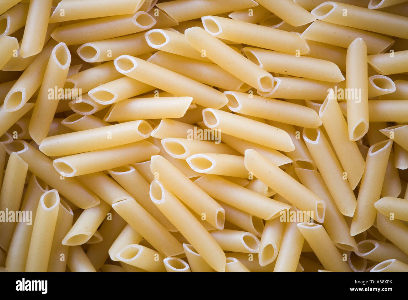 Patterns and textures penne pasta Stock Photo - Alamy