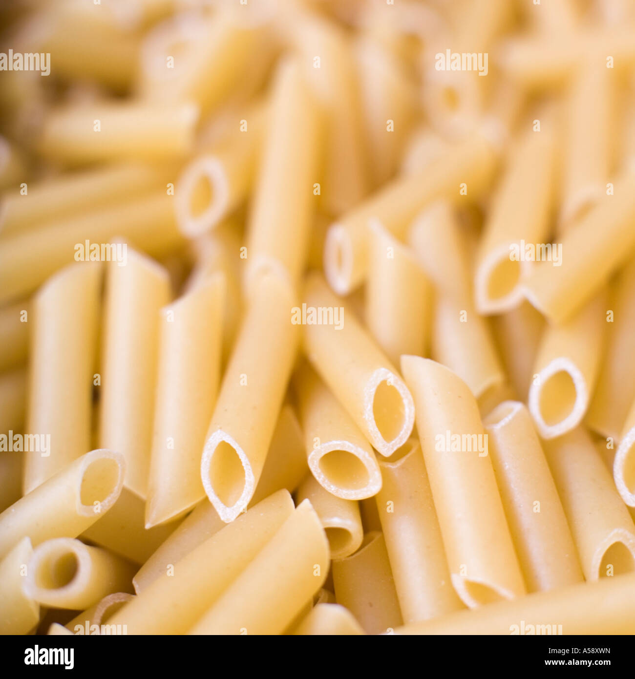 Patterns and textures penne pasta Stock Photo - Alamy