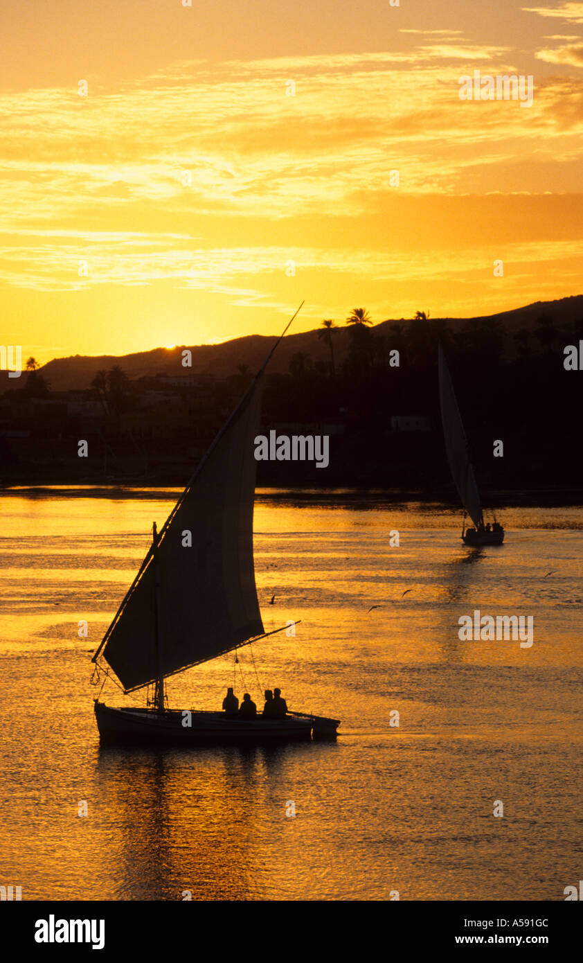 ship felucca boats on the Nile River Aswan Upper Egypt Egypt North ...