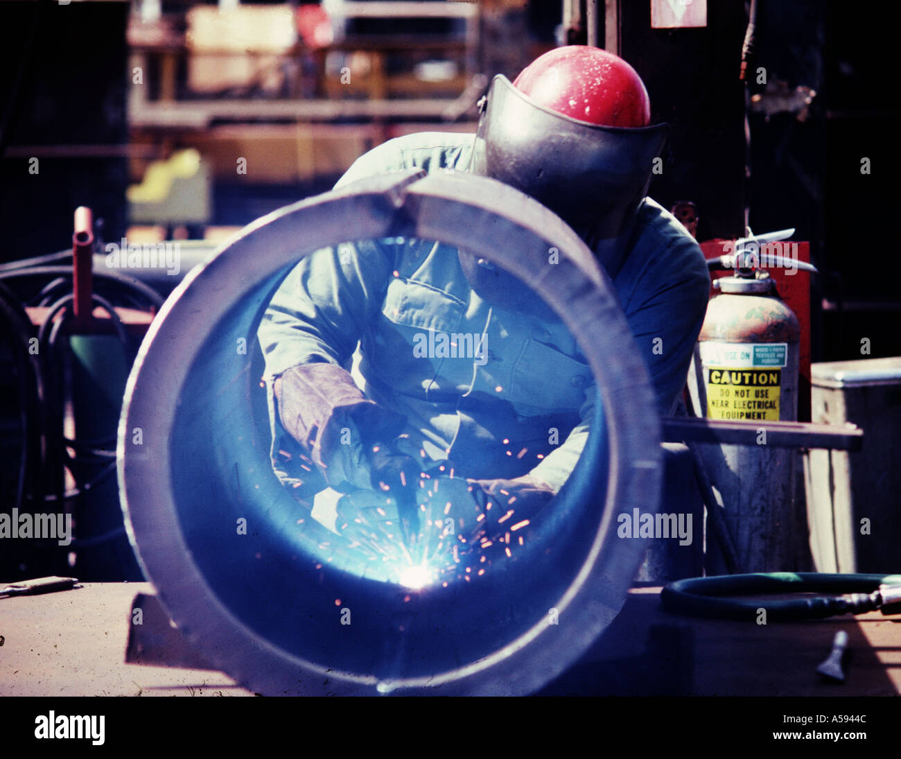 Welder heavy industry Stock Photo - Alamy