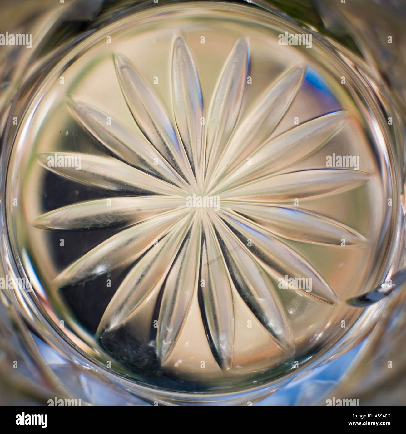 Patterns and textures looking through the bottom of a whiskey glass ...