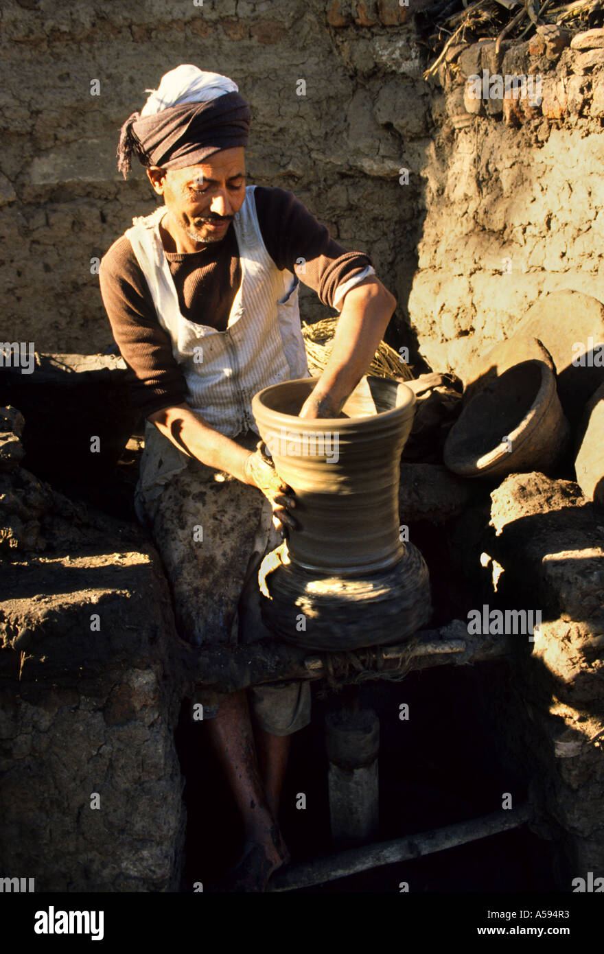 ceramic pottery potter's workshop earthenware crockery between Asyut ...
