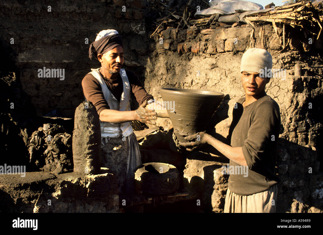 ceramic pottery potter's workshop earthenware crockery between Asyut ...