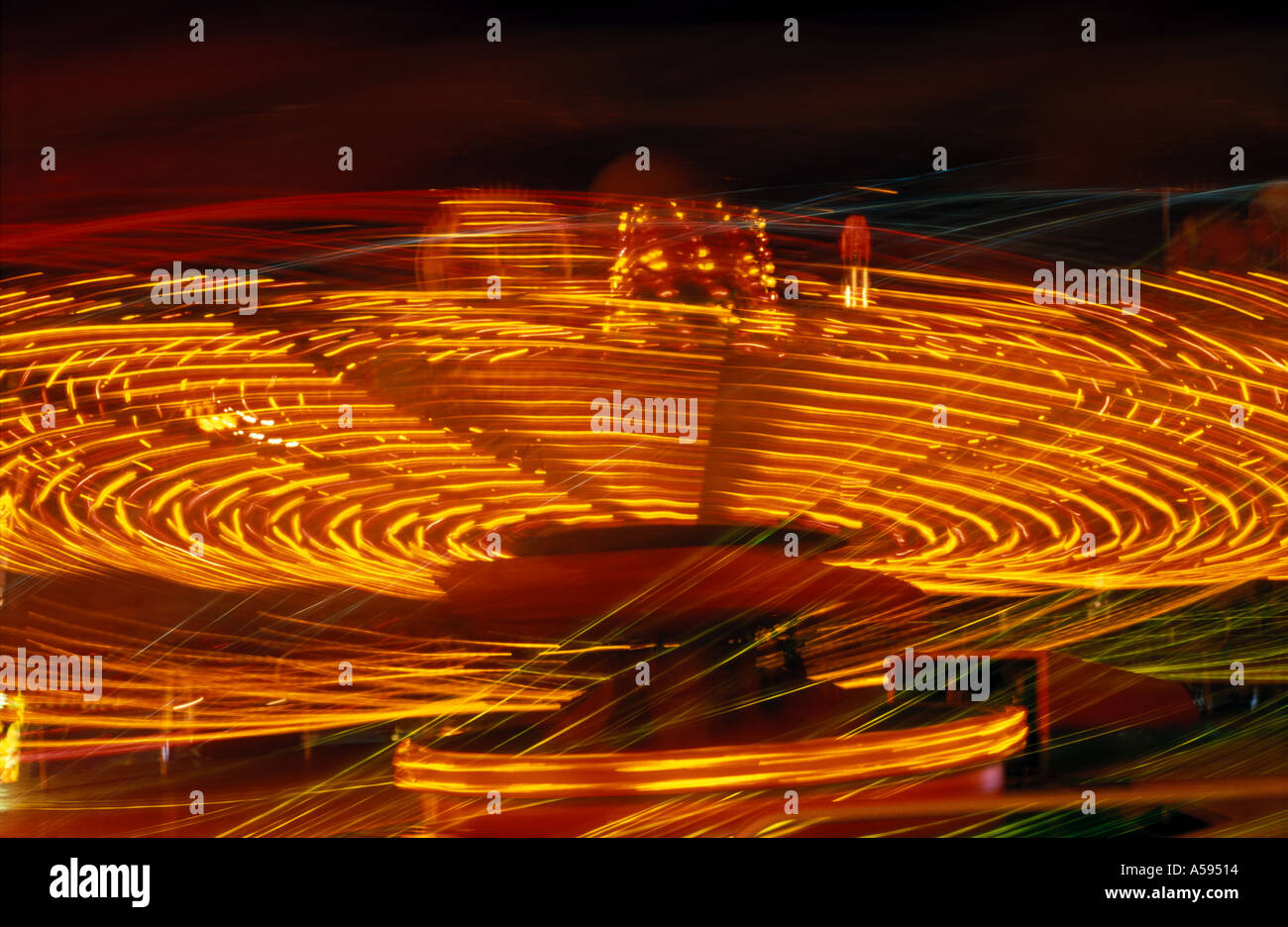 Spinning fairground wheel Stock Photo - Alamy