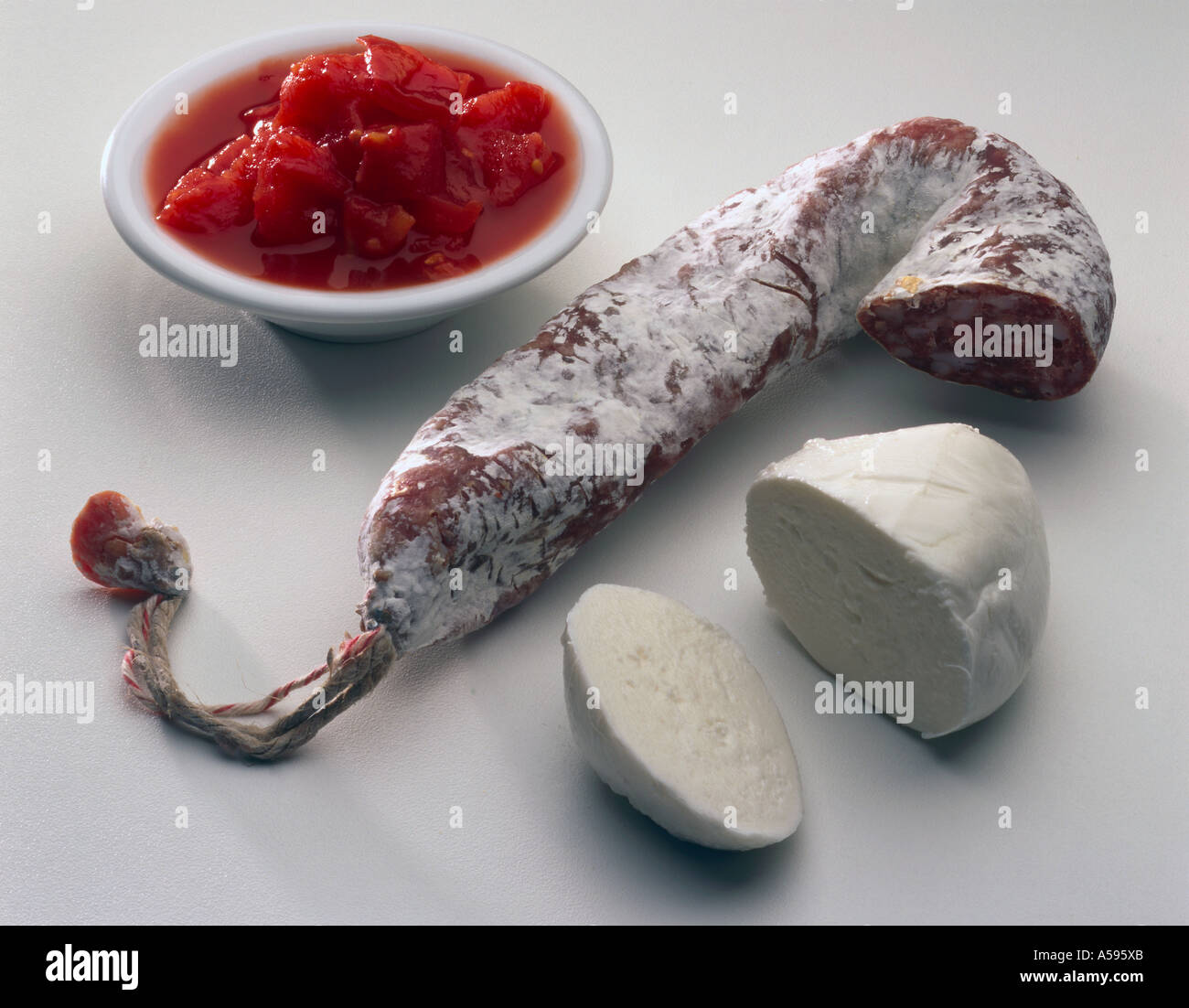 Chorizo Sausage Canned chopped tomatoes Mozzarella Stock Photo - Alamy