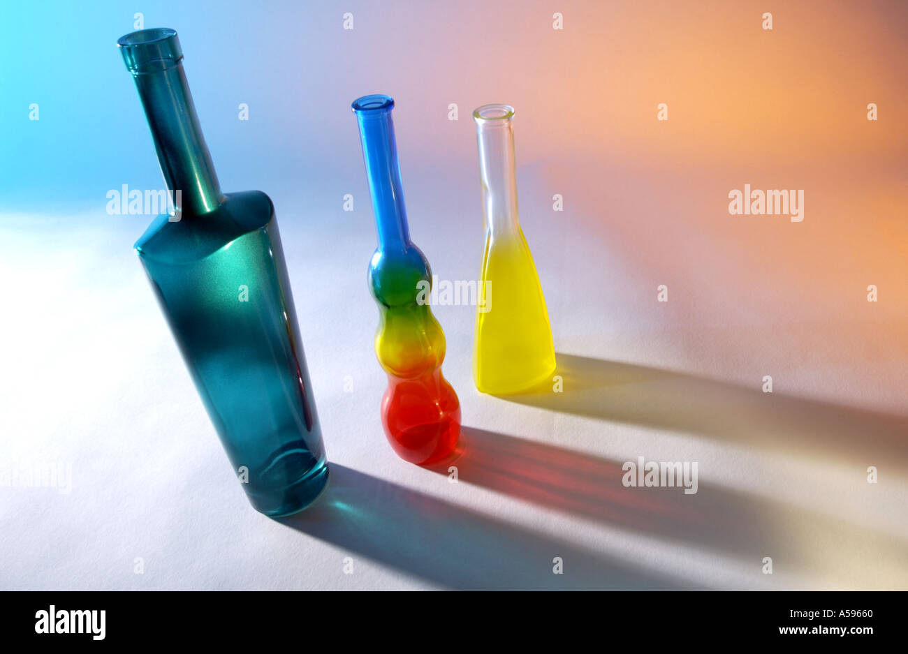 Display of coloured glass bottles Stock Photo - Alamy