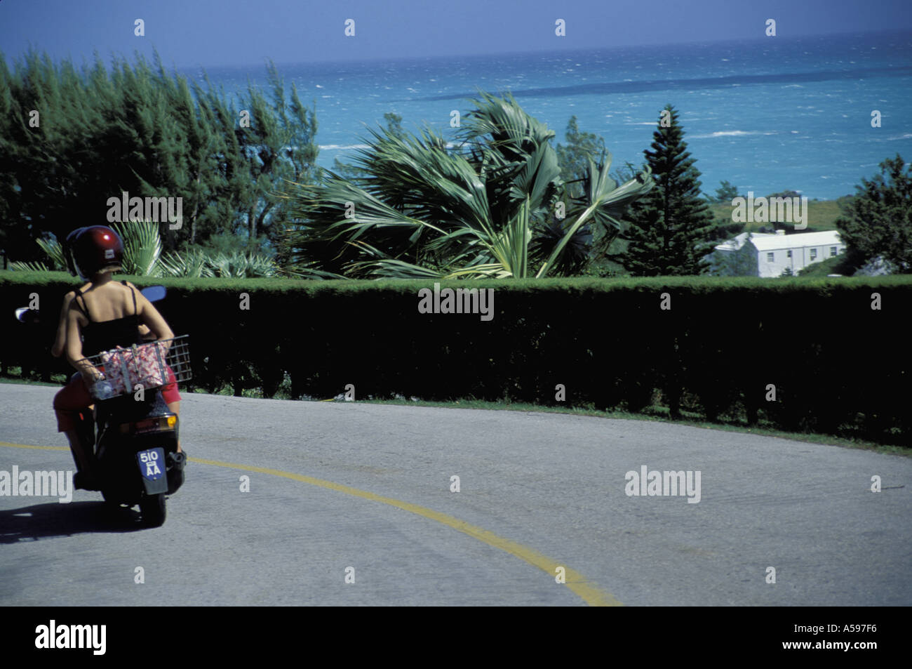 Riders on moped Southampton Parish Bermuda in the Caribbean Stock Photo ...