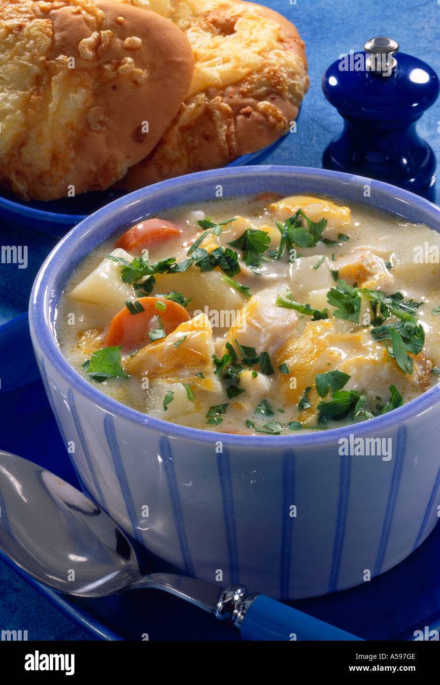 Individual fish pie in ramekin dish with bread rolls in b/g Stock Photo ...