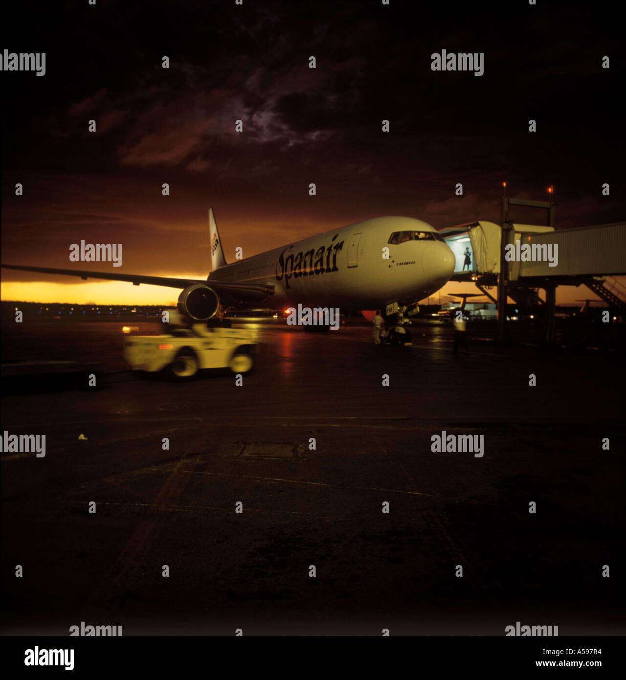 Night departure by Spanair Boeing 767 aircraft from Cancunn airport ...