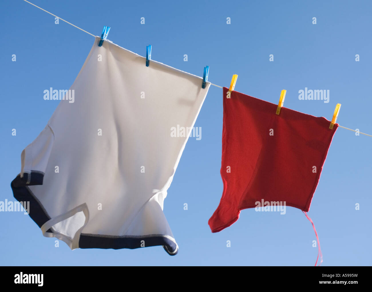 Clothes drying on a washing line Stock Photo - Alamy