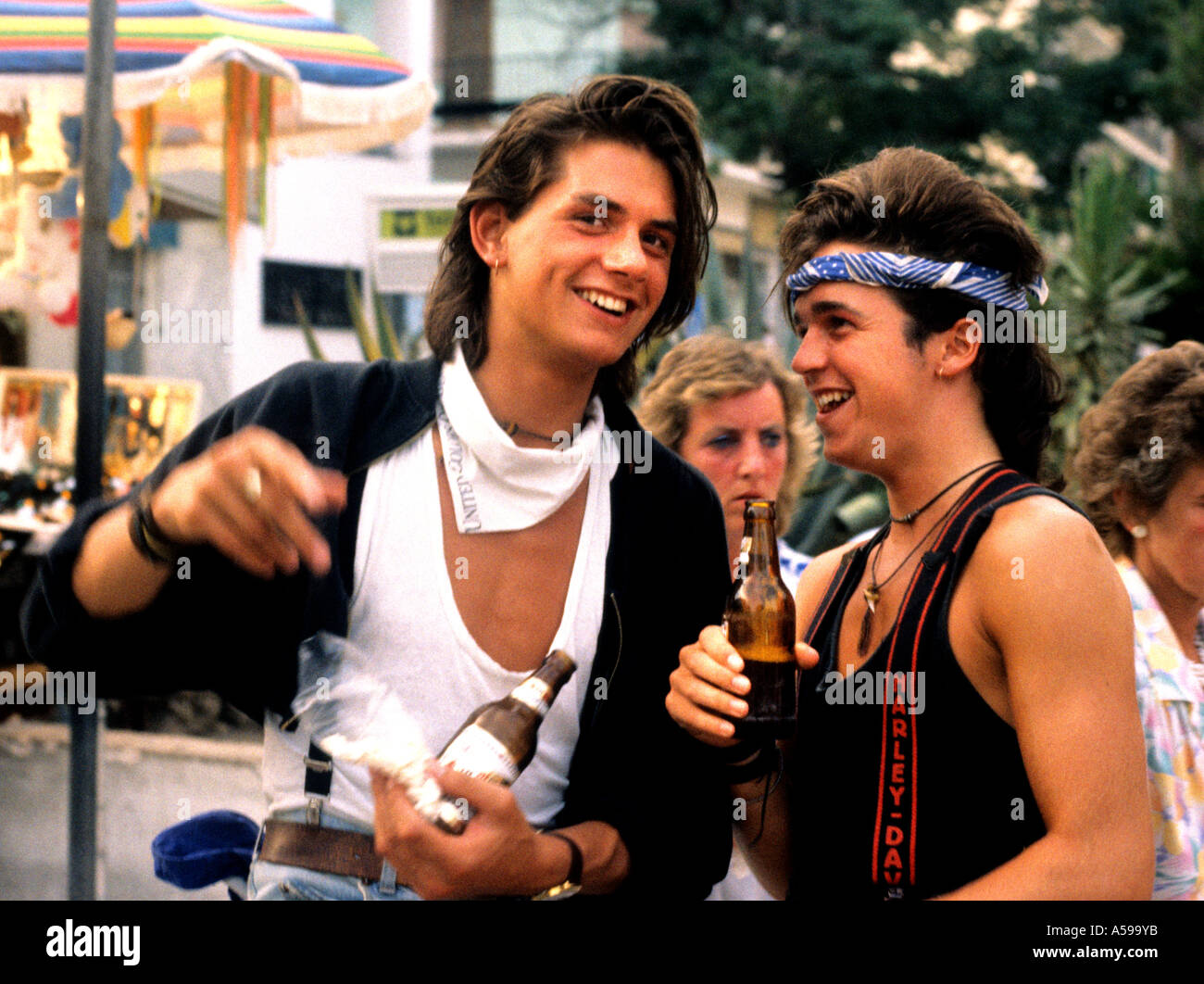 Teenager boy Boys Teenagers boy boys smile beer Malaga Beach Spain ...