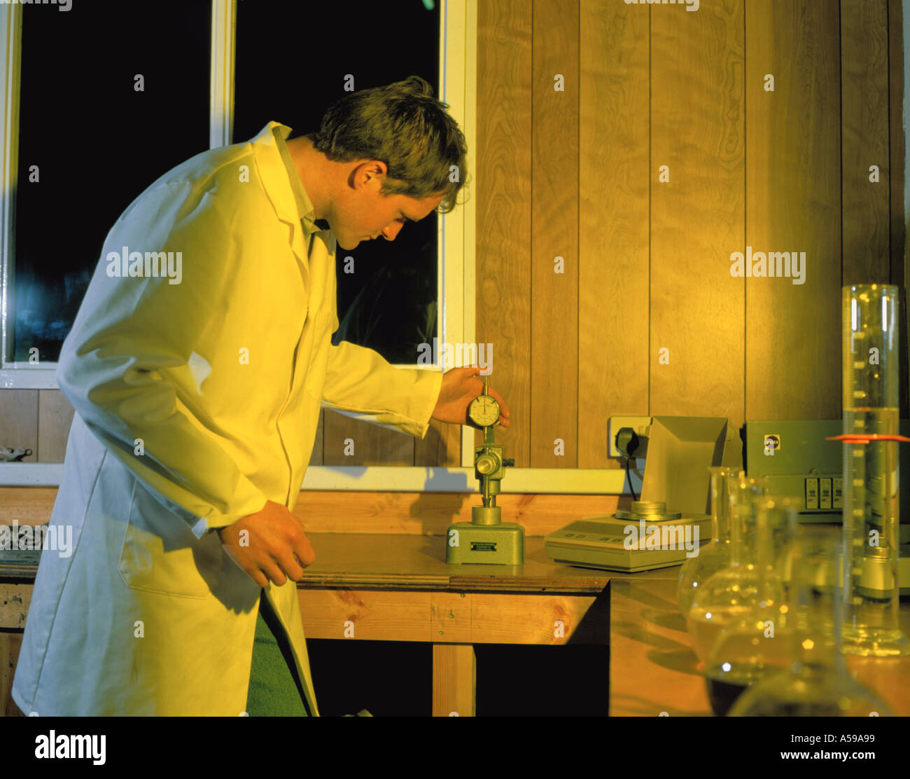 Technician conducting a penetrometer test on a soil sample Stock Photo ...