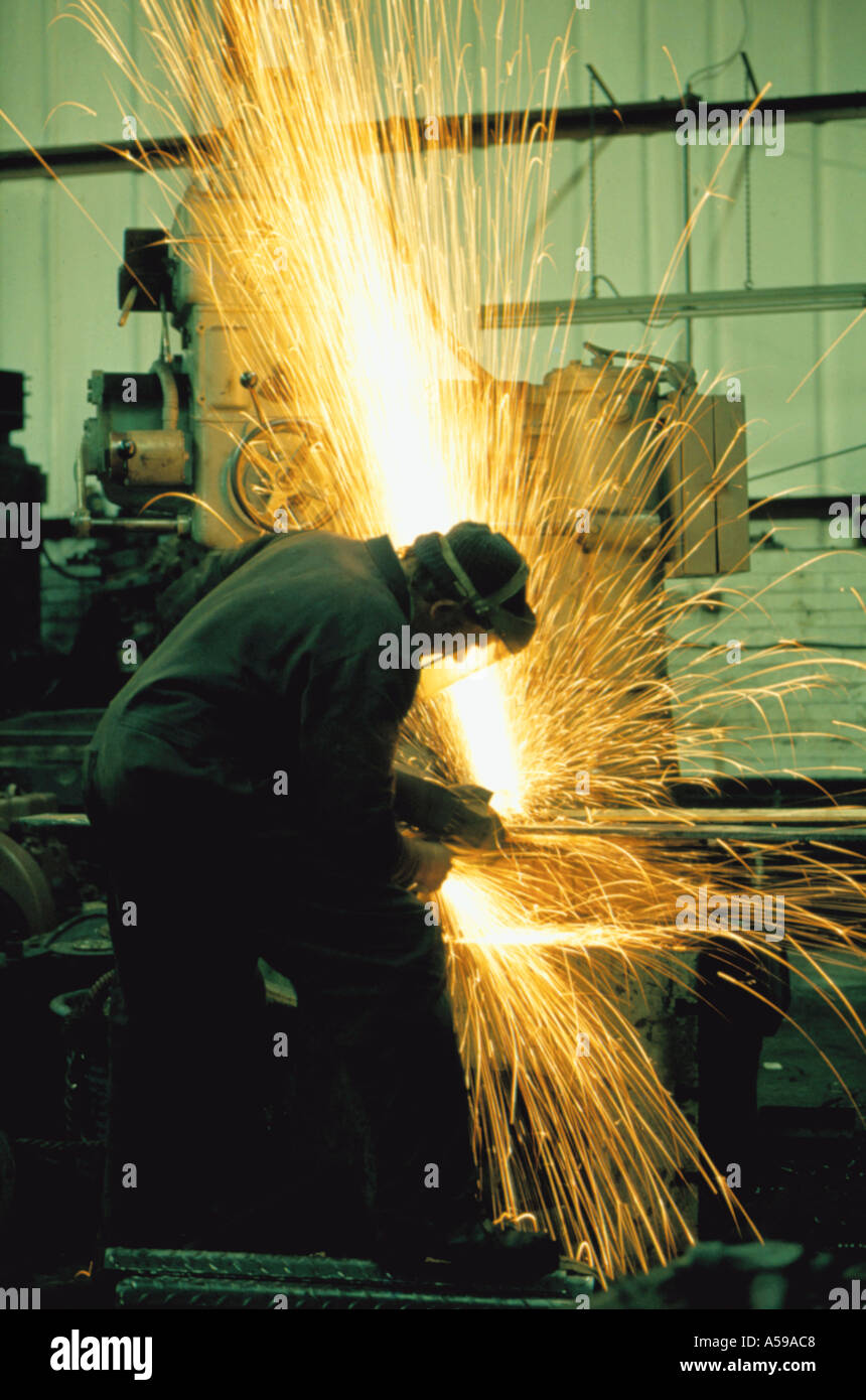 Grinding steel in an engineering workshop, England, UK Stock Photo - Alamy