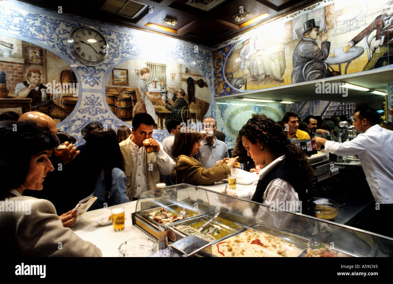 Madrid Spain restaurant beer ham wine sherry bar Stock Photo - Alamy