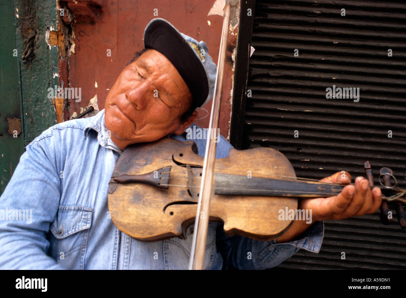 Blind Musician playing his violin at the street Stock Photo - Alamy
