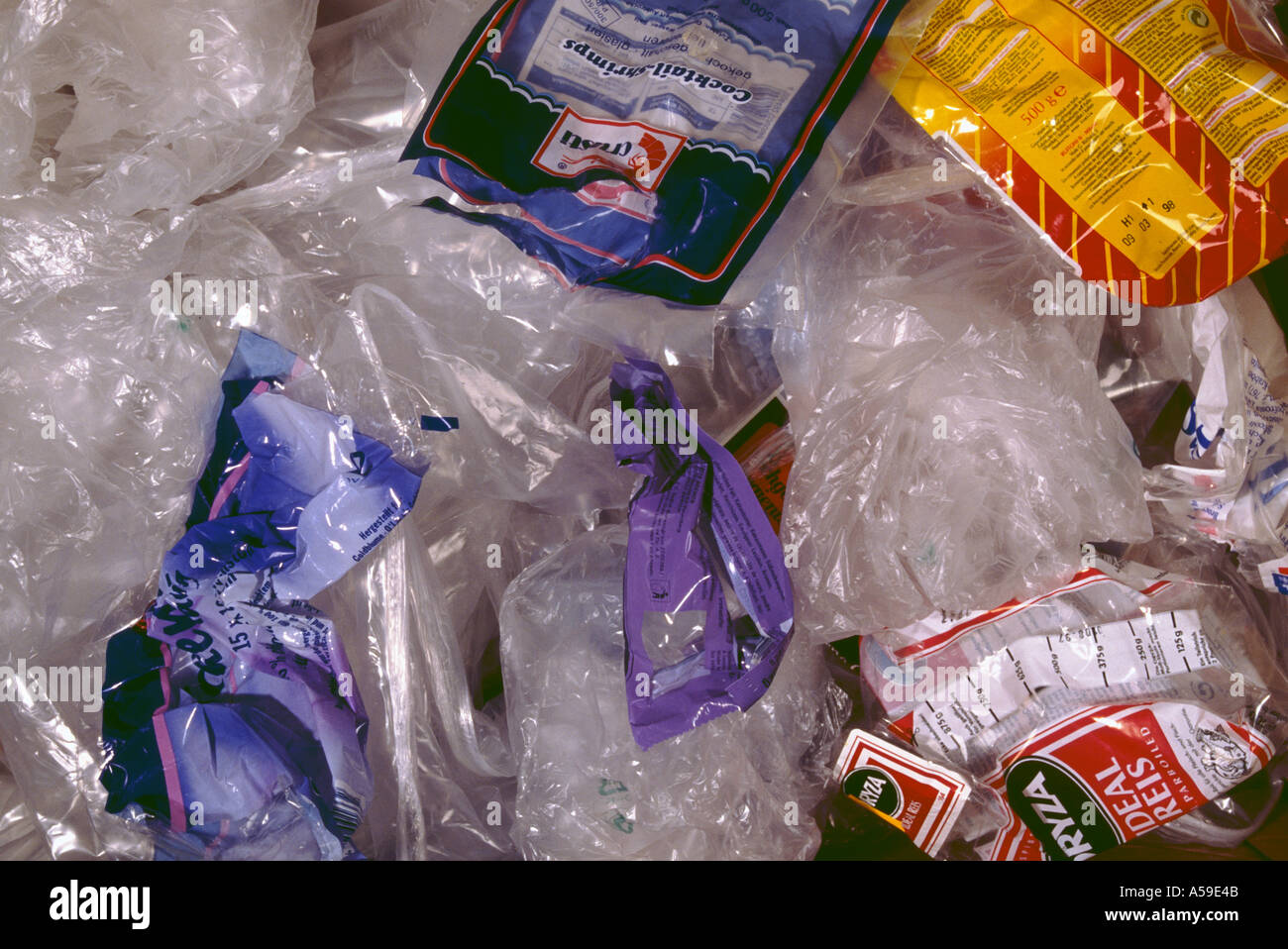 Recycling of plastics packages re processing Stock Photo - Alamy