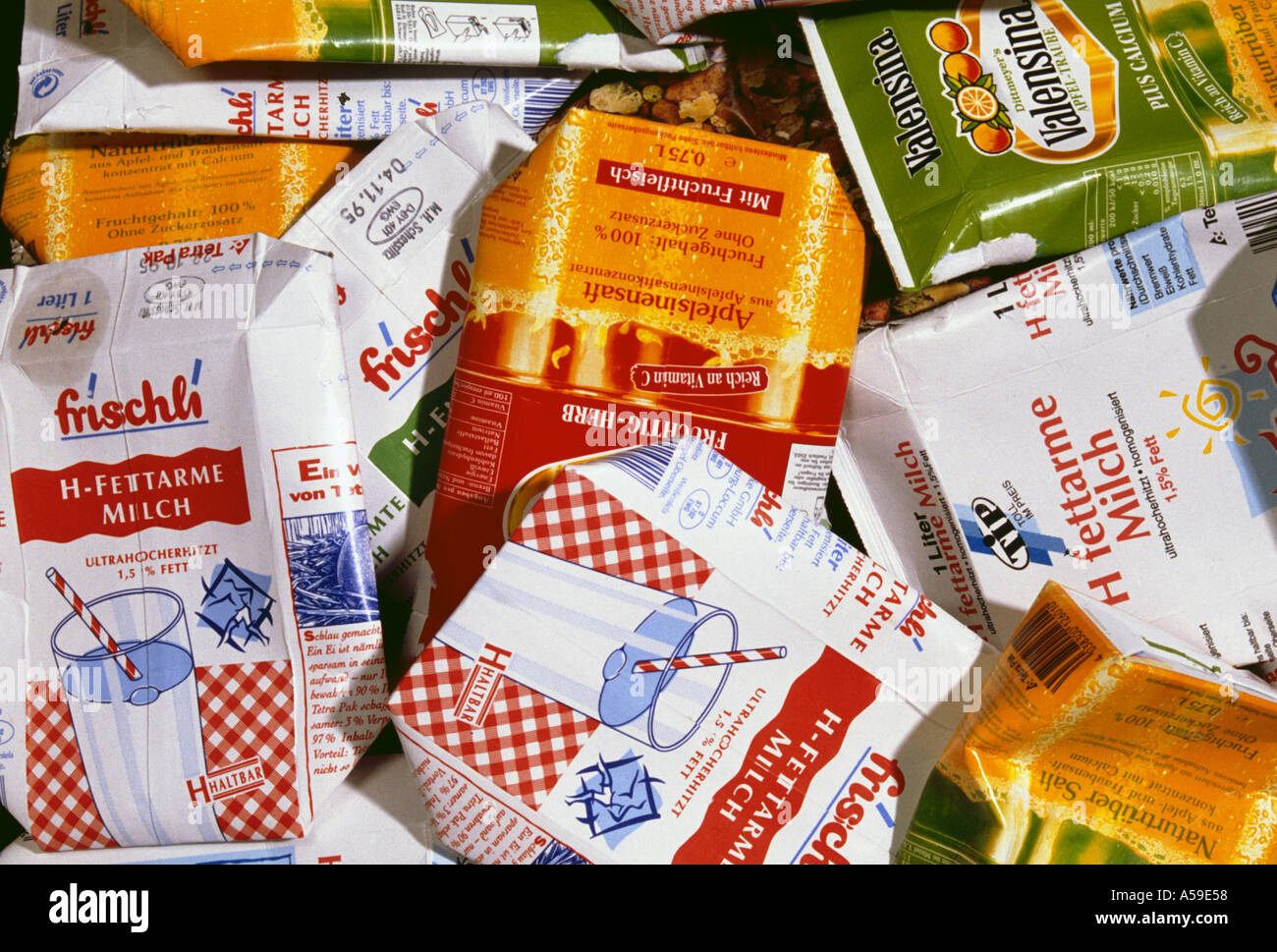 Recycling of plastics packages re processing Stock Photo - Alamy