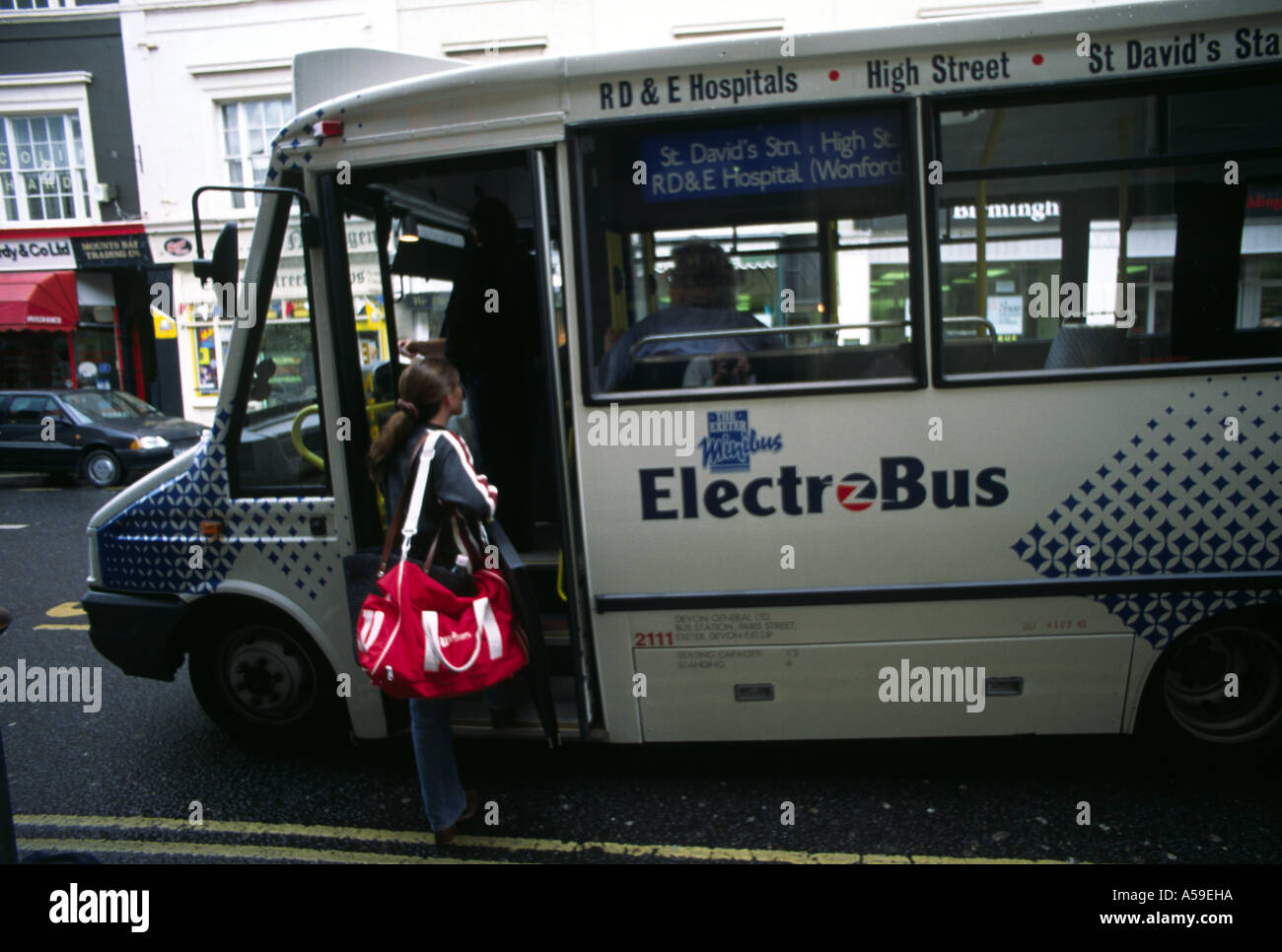 electric bus and passenger exeter devon uk Stock Photo - Alamy
