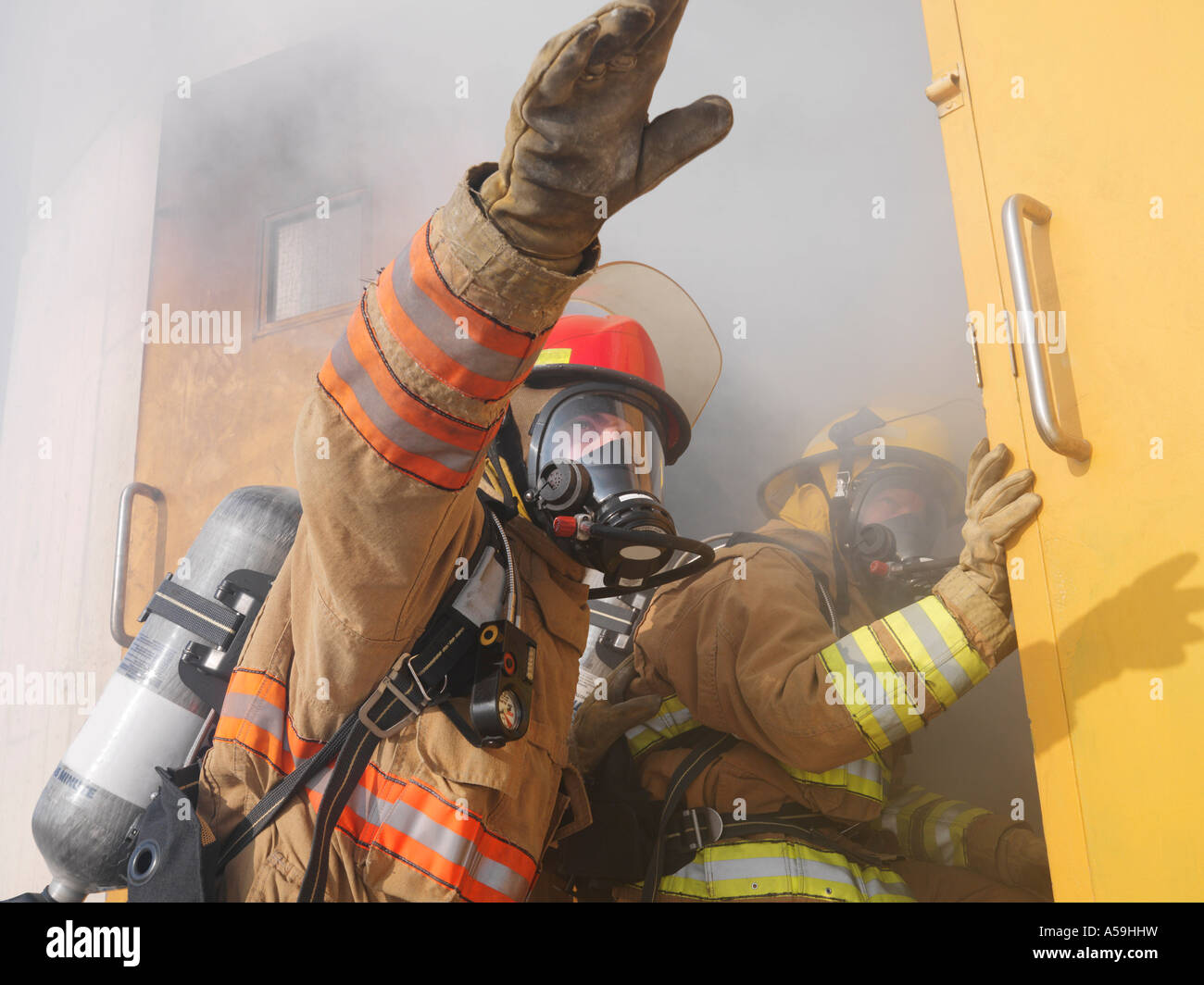 Fireman Kneeling High Resolution Stock Photography and Images - Alamy
