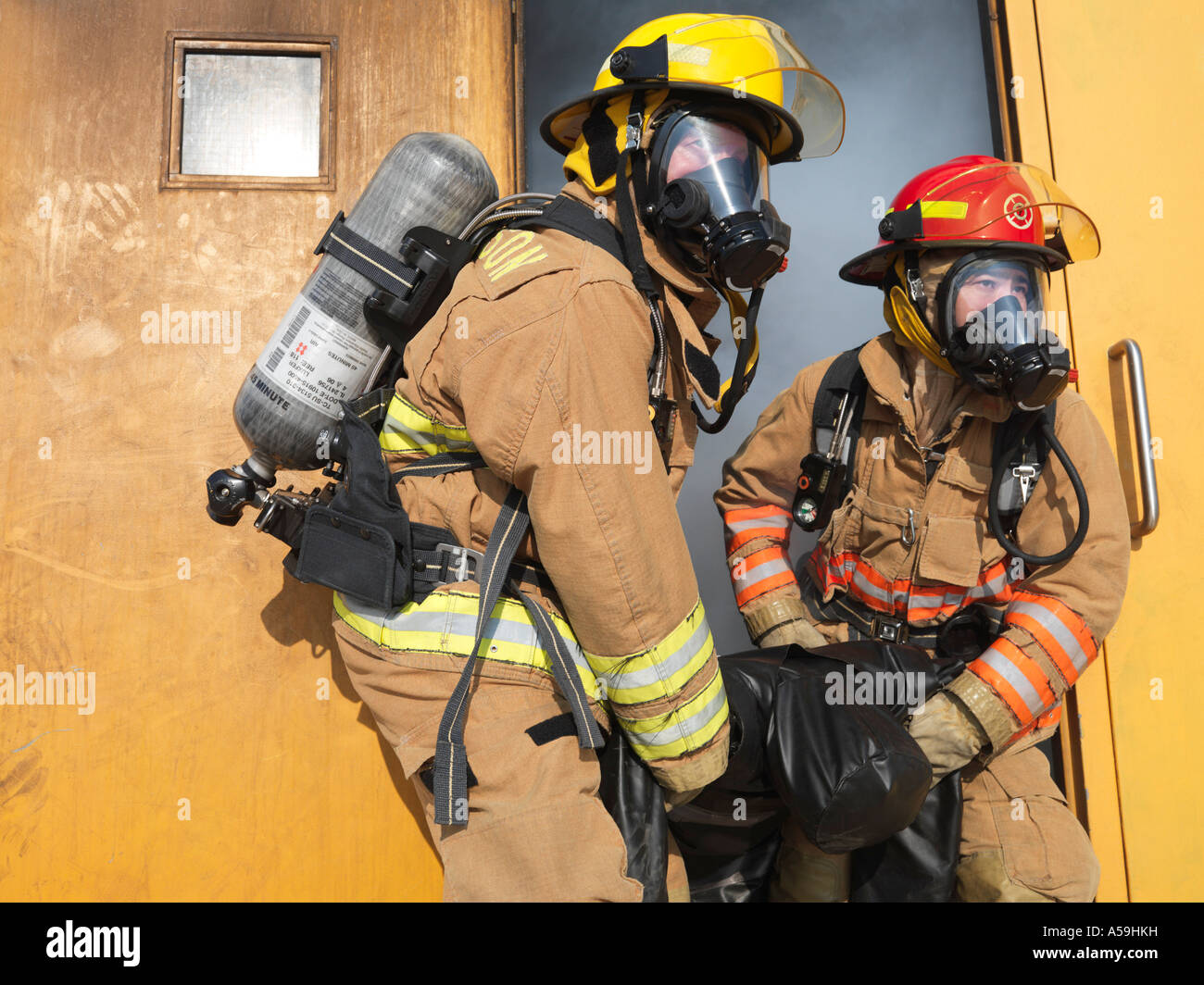 Firemans Carry High Resolution Stock Photography and Images - Alamy