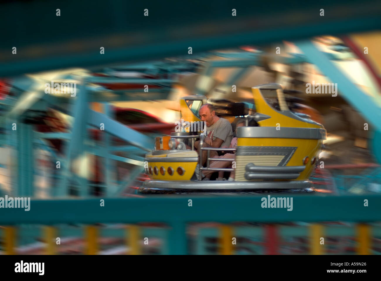 man on a fun ride Stock Photo - Alamy