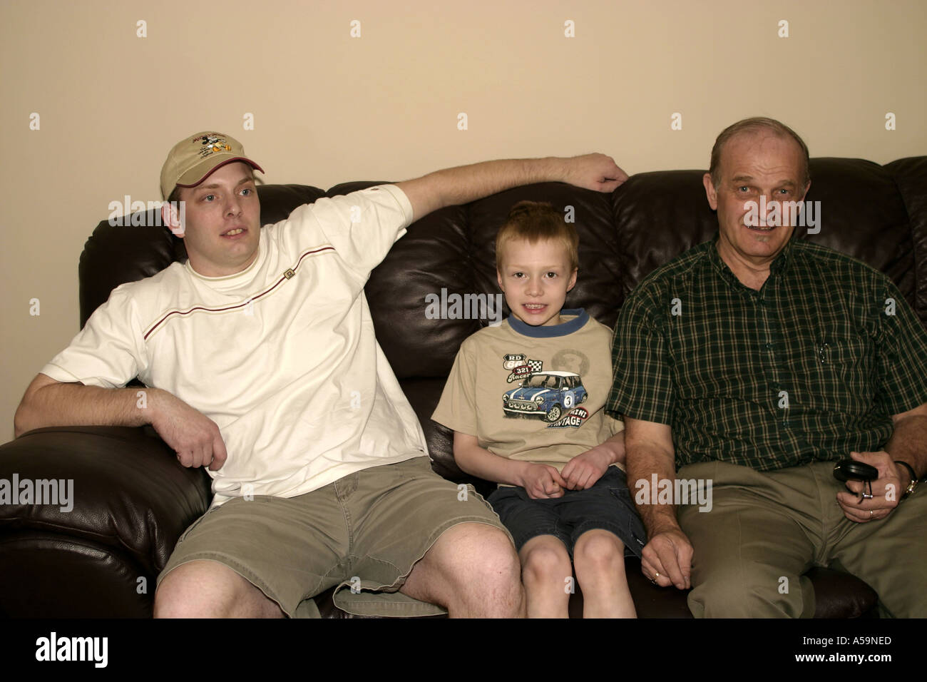 Father three generations sitting hi-res stock photography and images ...