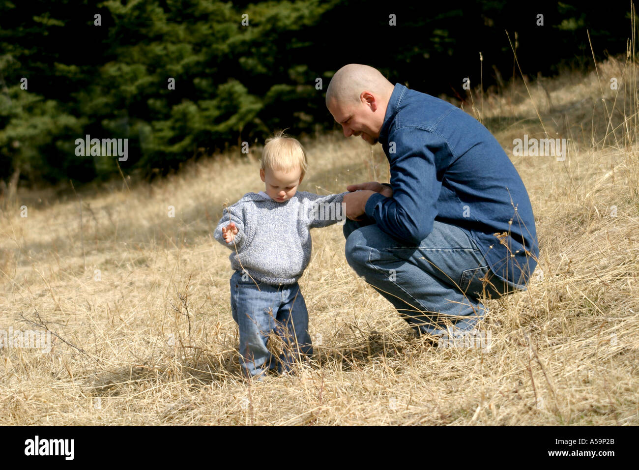 Father with his small son Stock Photo - Alamy