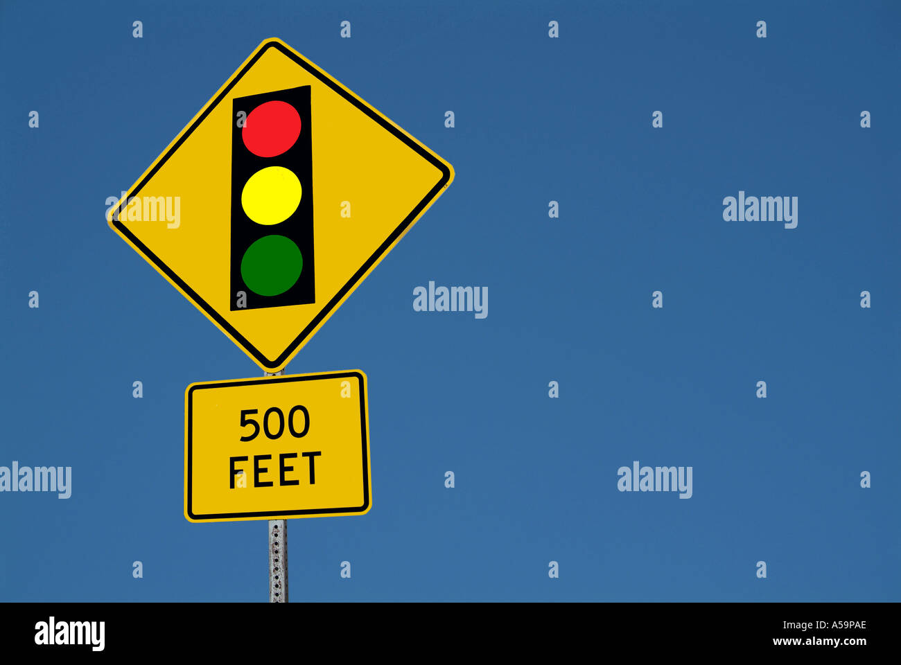 Stop signal 500 feet ahead sign Stock Photo - Alamy