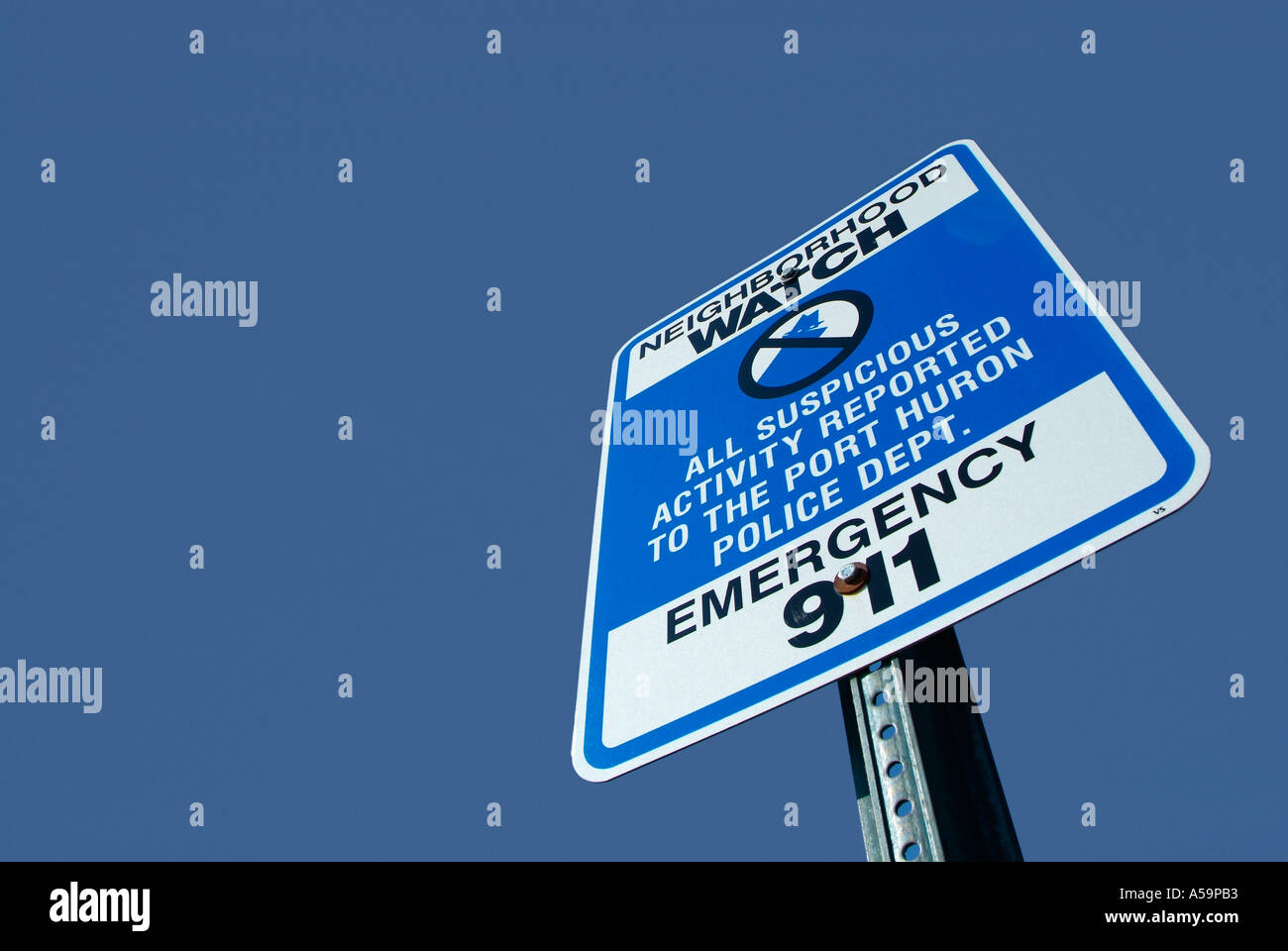 Neighborhood watch sign advises suspicious activity to be reported to ...