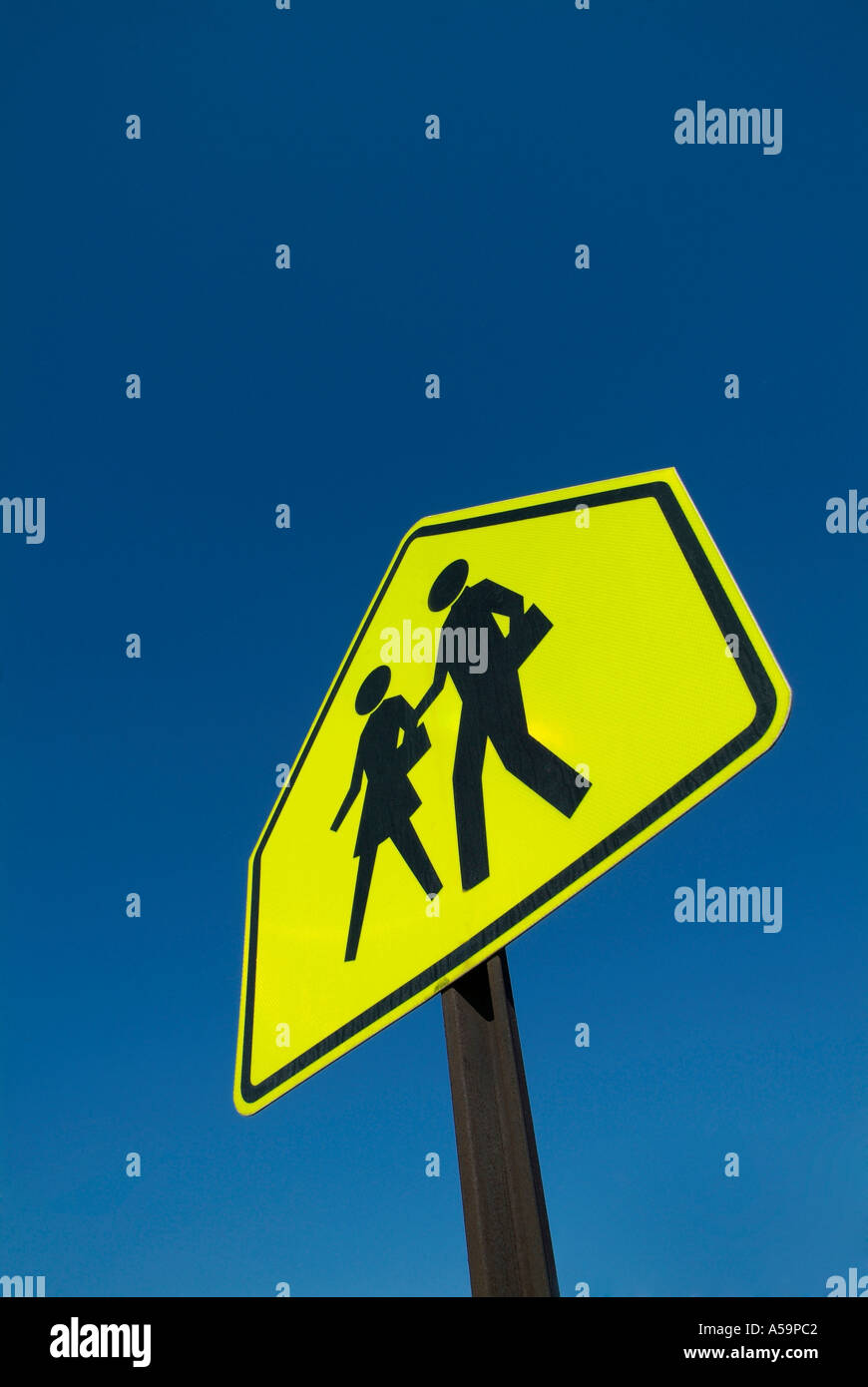 School crossing sign for walking students Stock Photo - Alamy