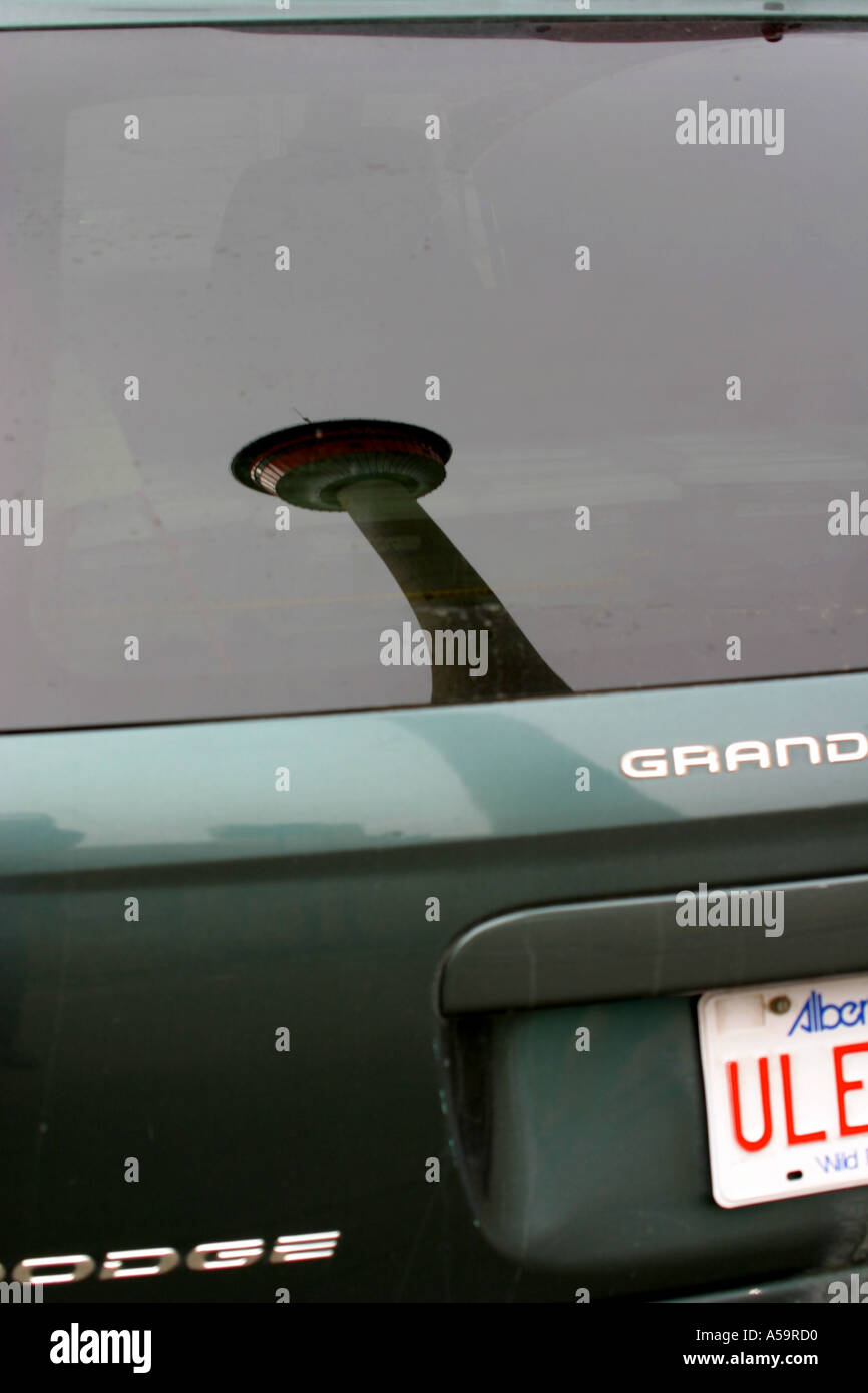 REFLECTIONS of the Calgary Tower in back window of a car Stock Photo ...