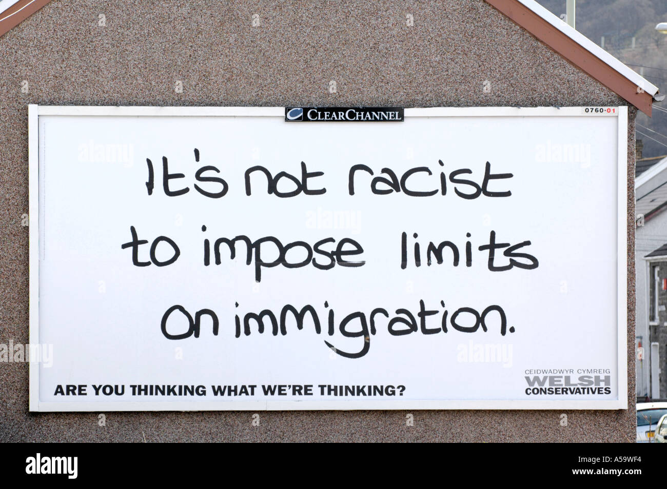 Conservative immigration election poster on the end of a terraced house ...