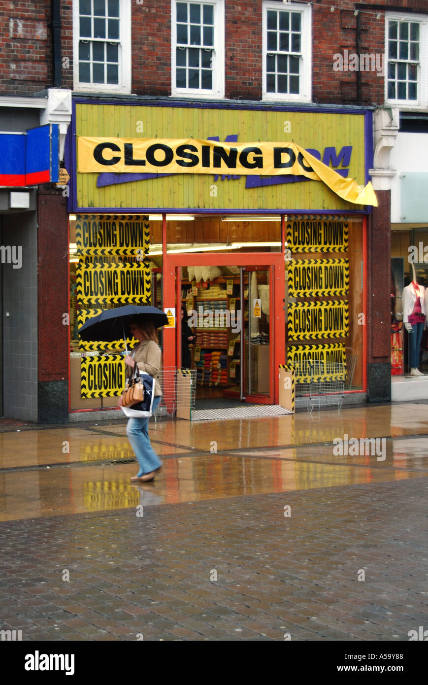 Typical high street shop unit housing small independent business with ...