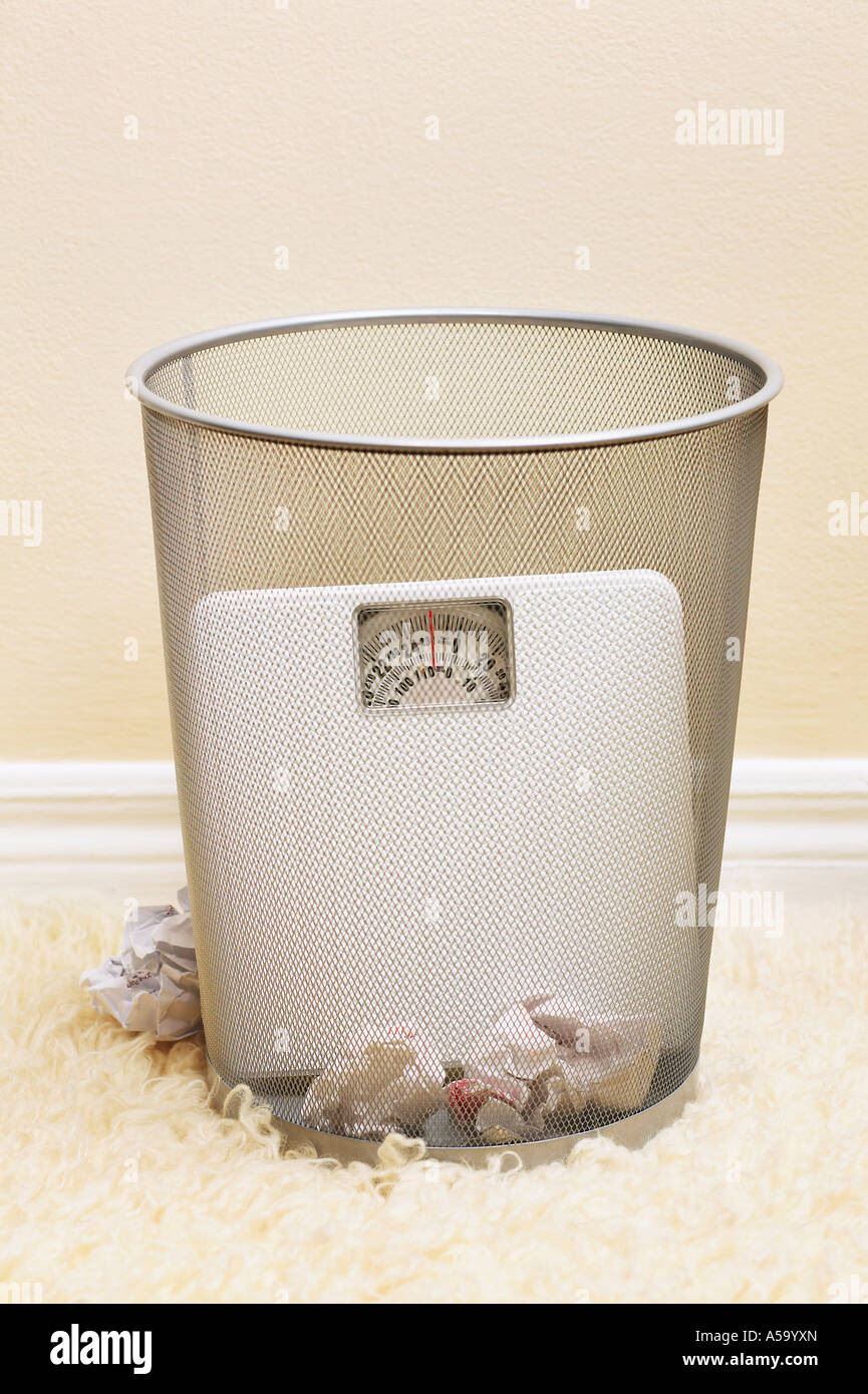 Scale in Garbage Can Stock Photo - Alamy